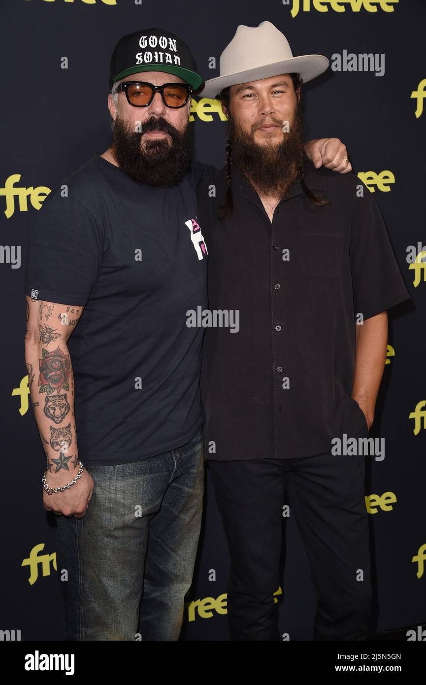 Titus Welliver and Stephen A. Chang walking on the red carpet at the Los Angeles premiere of ...