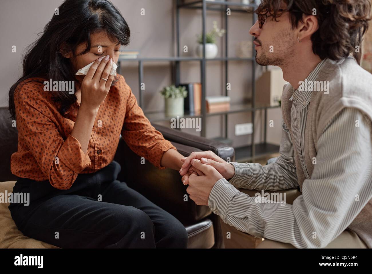 Horizontal Shot Of Modern Professional Psychotherapist Comforting
