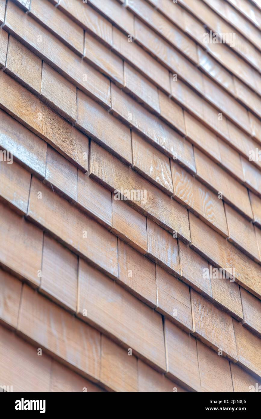 Low angle view of a wall with wooden shingle sidings at San Francisco ...