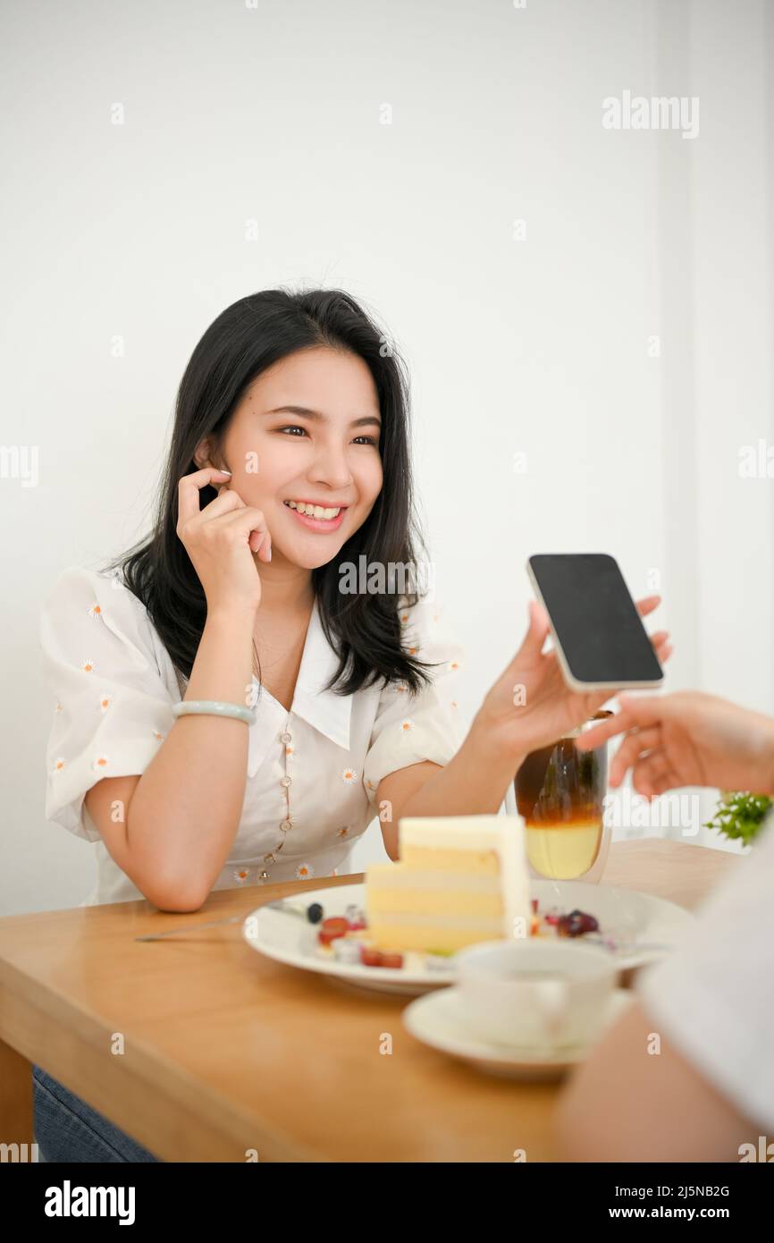 Portrait and close-up, Attractive millennial Asian woman enjoy chatting ...