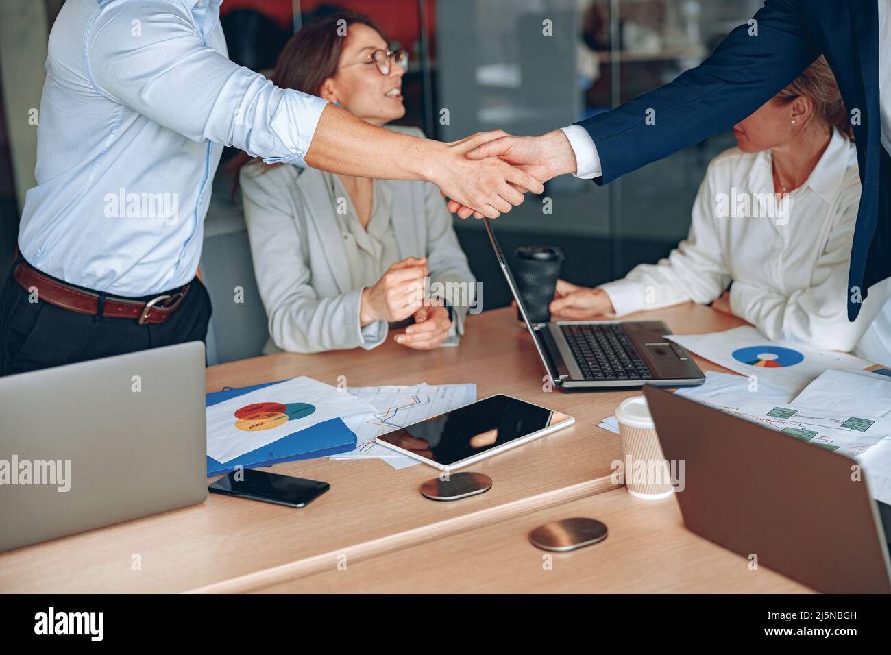 Business male partnership handshake. Photo handshaking process ...
