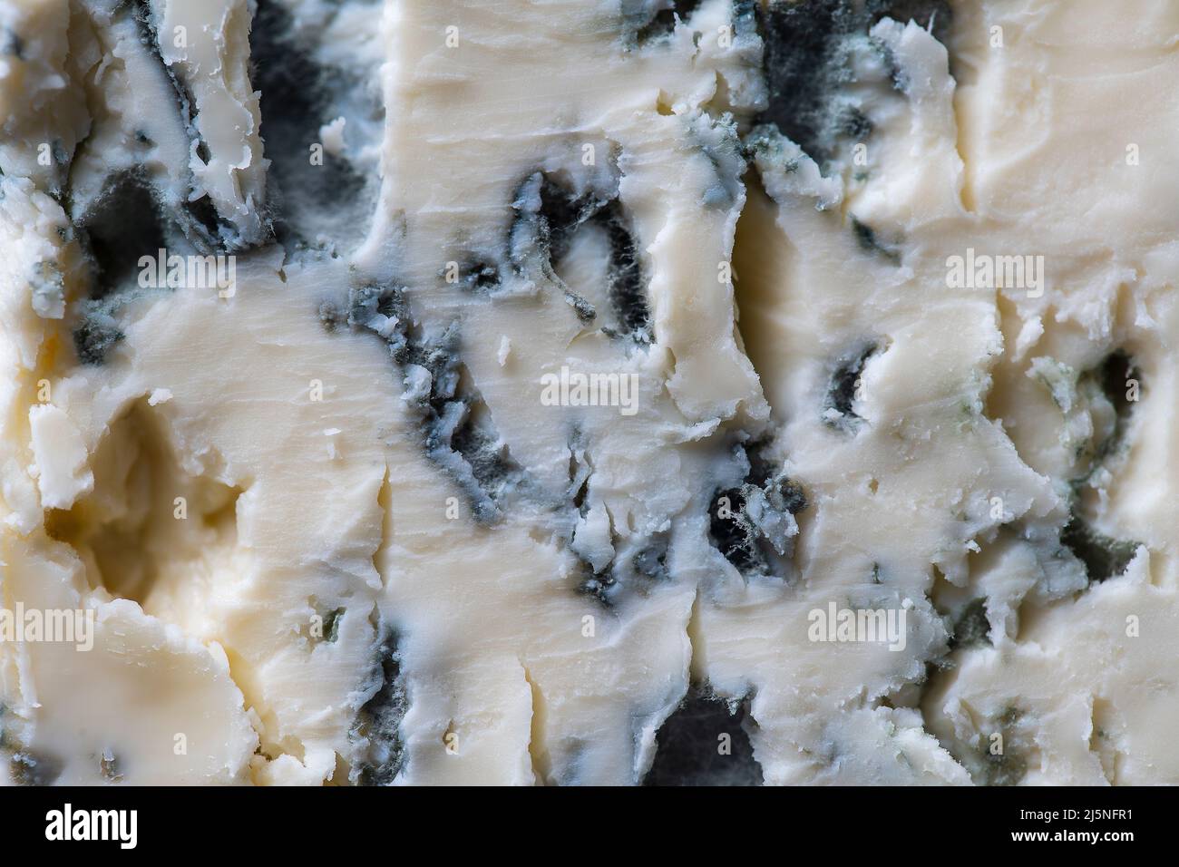 Blue cheese background and texture in the cut, top view, close up ...