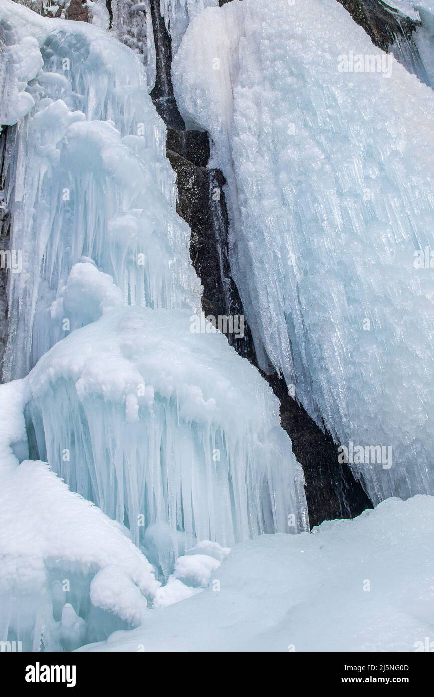 Frozen waterfall in the Zailiyskiy Alatau mountains in central asia on a frosty winter day Stock ...