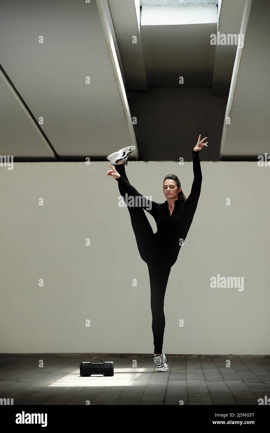 Woman jumpsuit dancing hi-res stock photography and images - Alamy