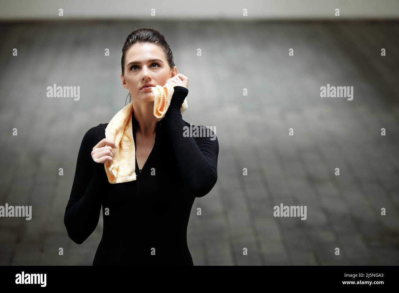 Portrait tired caucasian sportswoman wiping hi-res stock photography ...