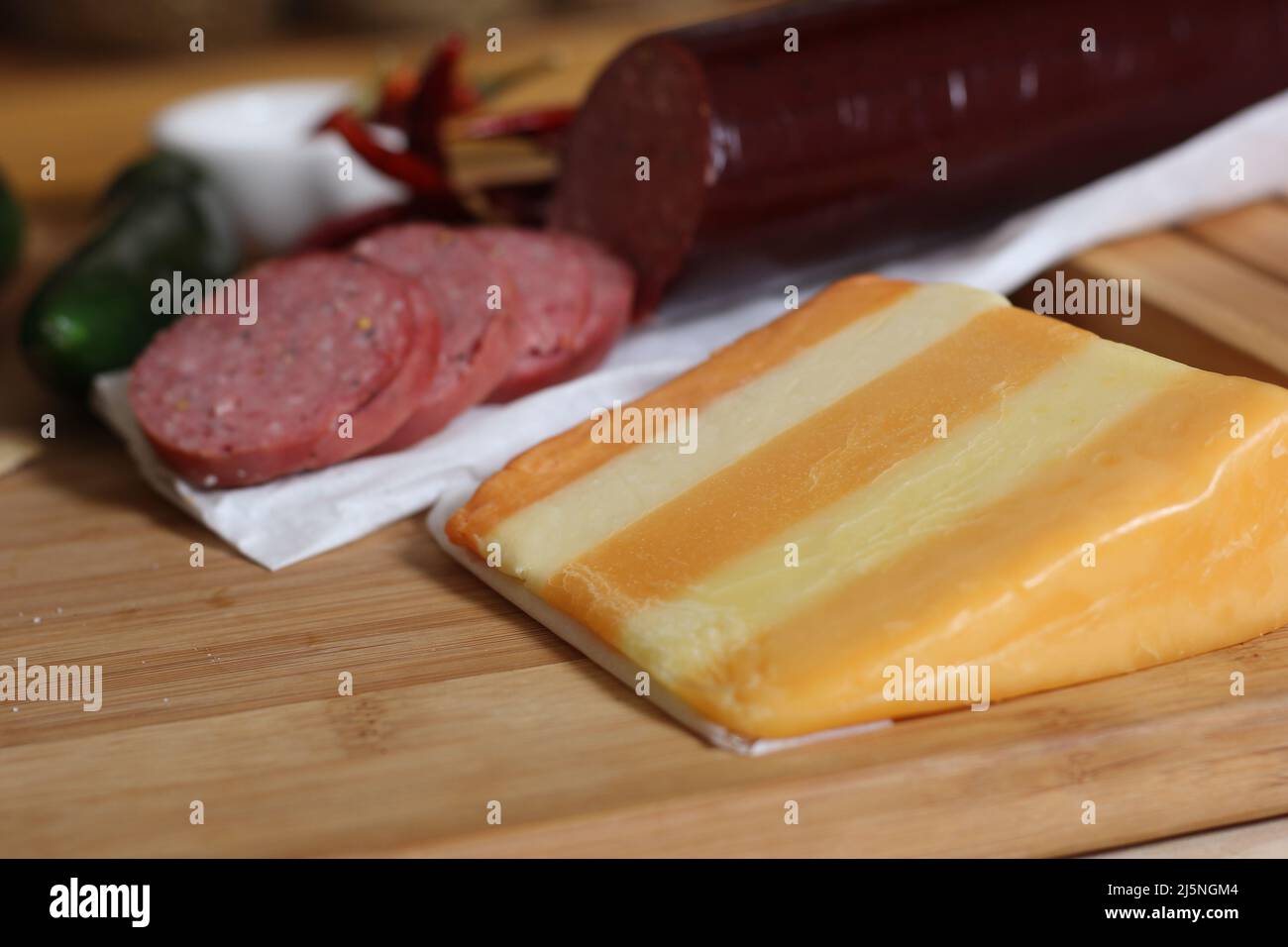 English Shire Cheese and Irish Cheese and Spices in Rustic Kitchen ...