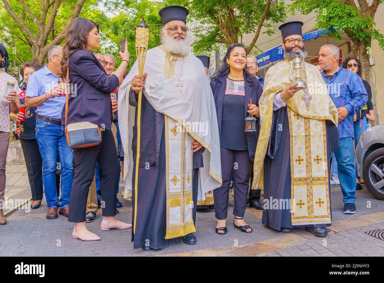 Nazareth, Israel - April 23, 2022: Priests and other march with the ...