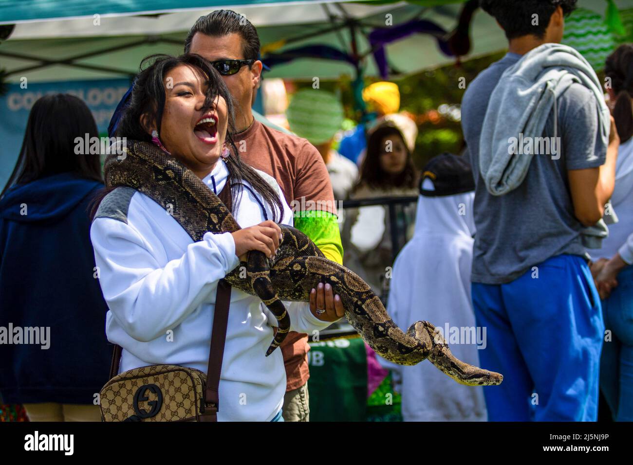 Reno, United States. 24th Apr, 2022. A woman laughs while posing for a ...