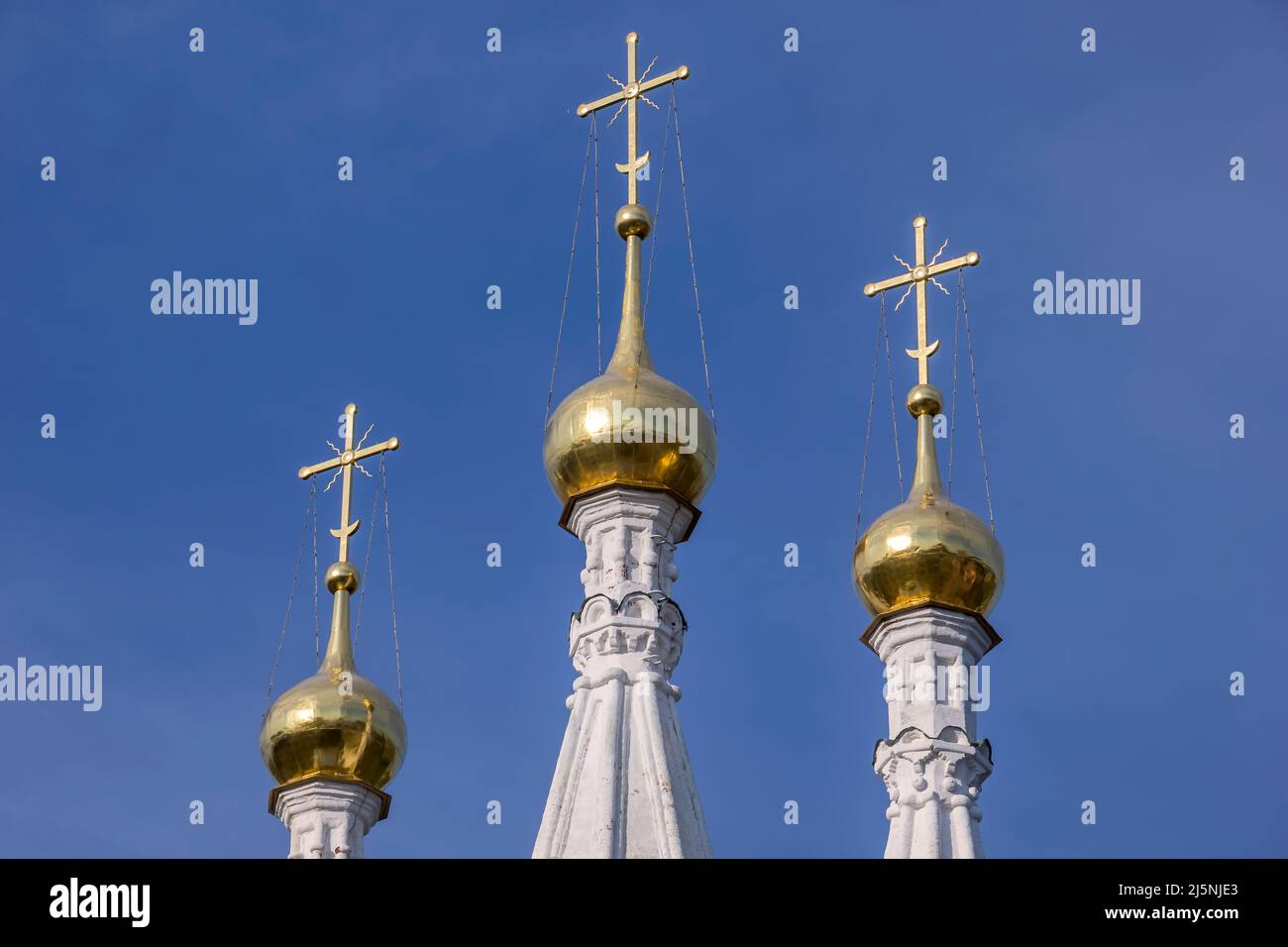 Part of the church with golden crosses on golden domes Stock Photo - Alamy