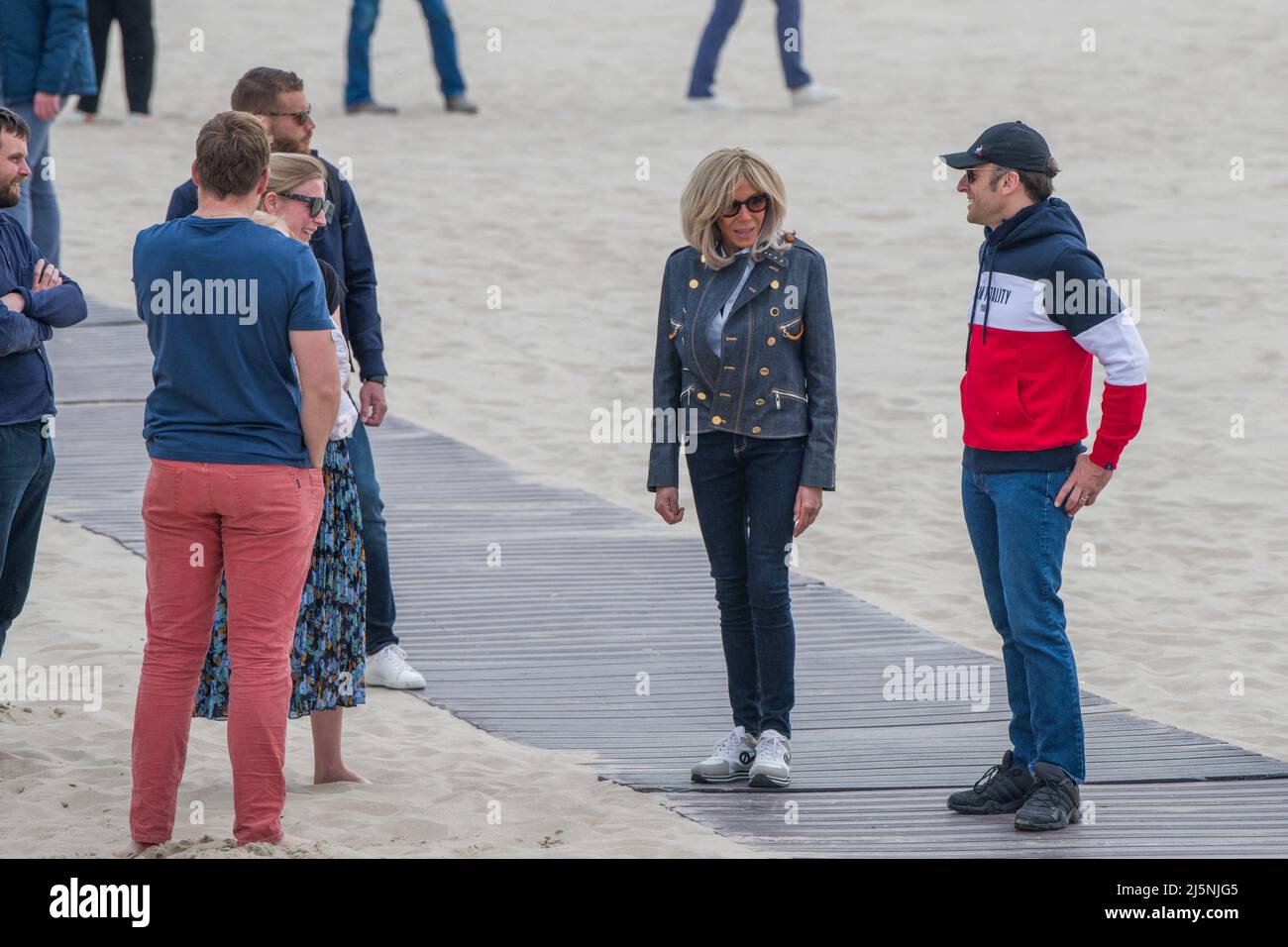 French President Emmanuel Macron and wife Brigitte Macron walking on ...