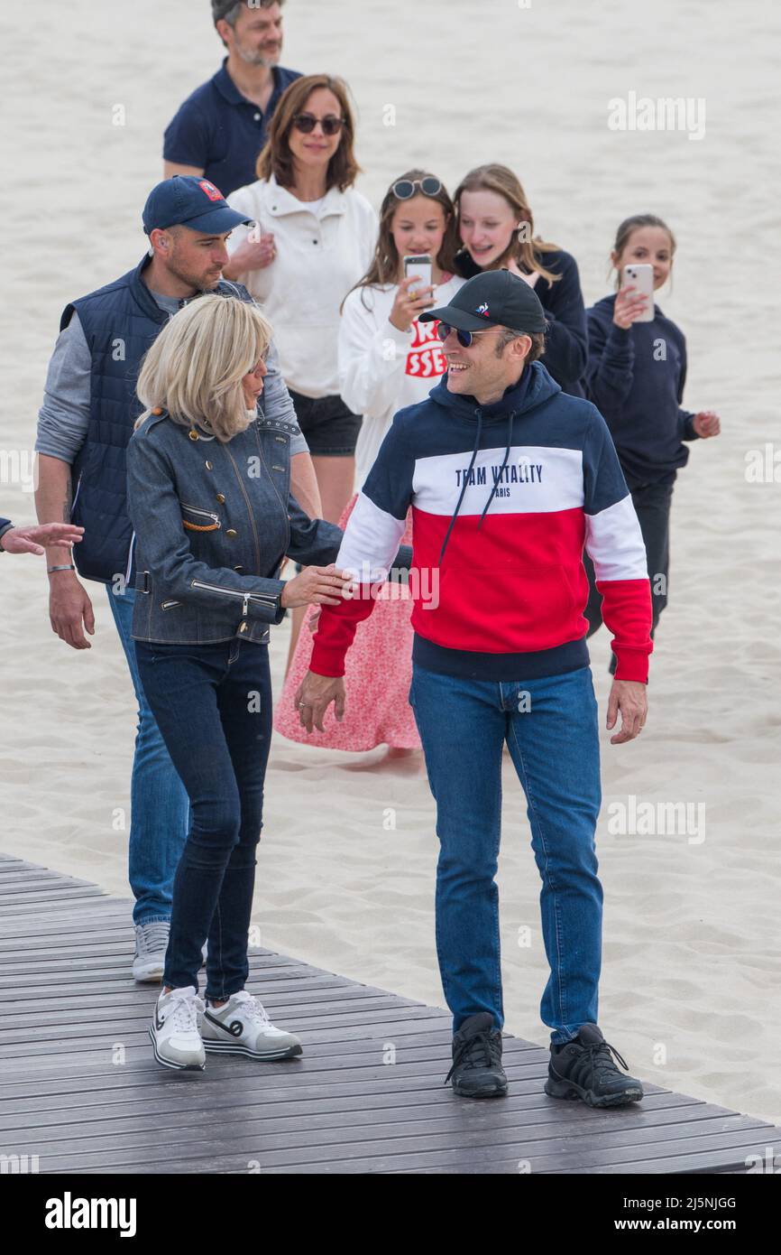 French President Emmanuel Macron and wife Brigitte Macron walking on ...
