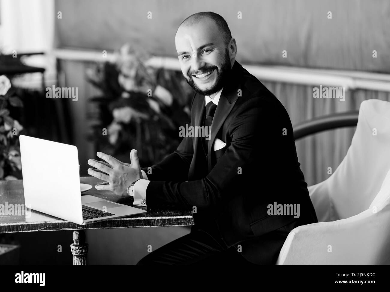 Businessman smile computer screen Black and White Stock Photos & Images ...