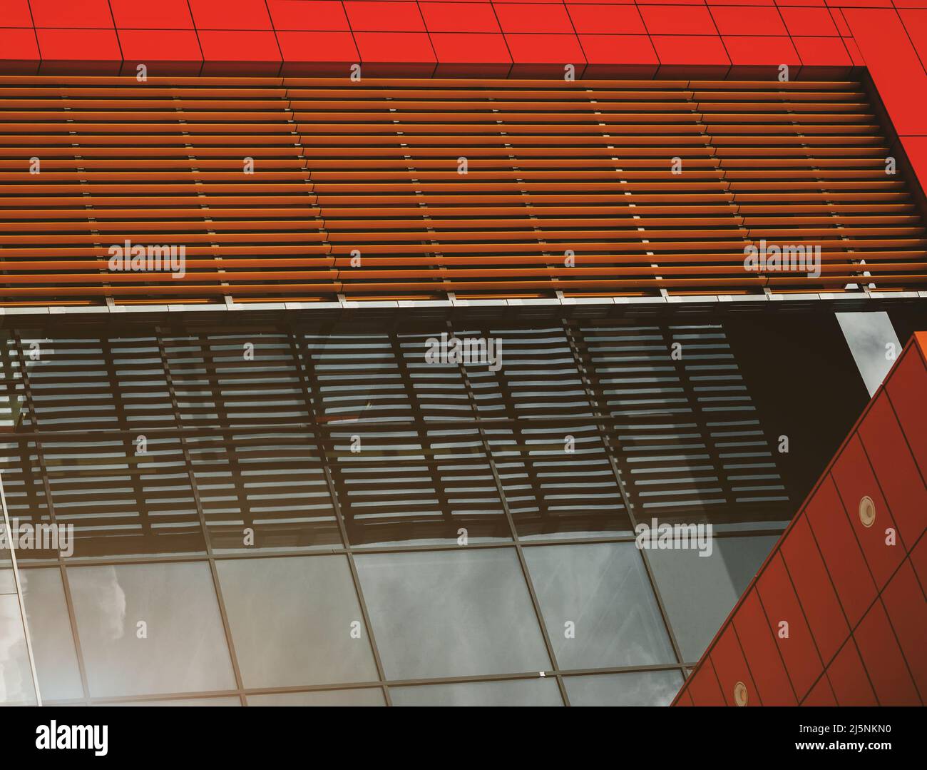 Colorful modern facade office building. architectural detail of red ...