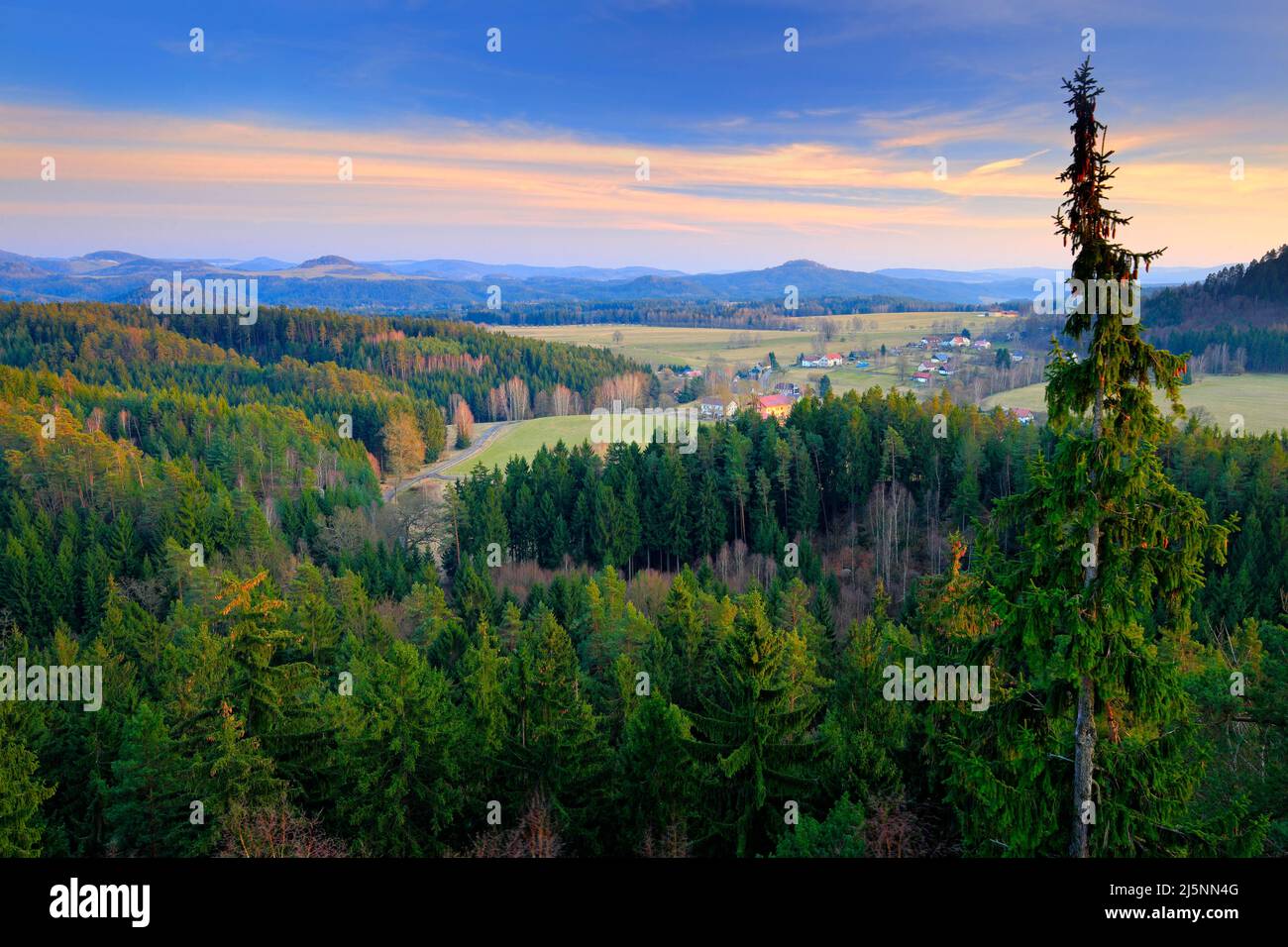 Czech typical forest landscape. Hills and villages in summer morning ...