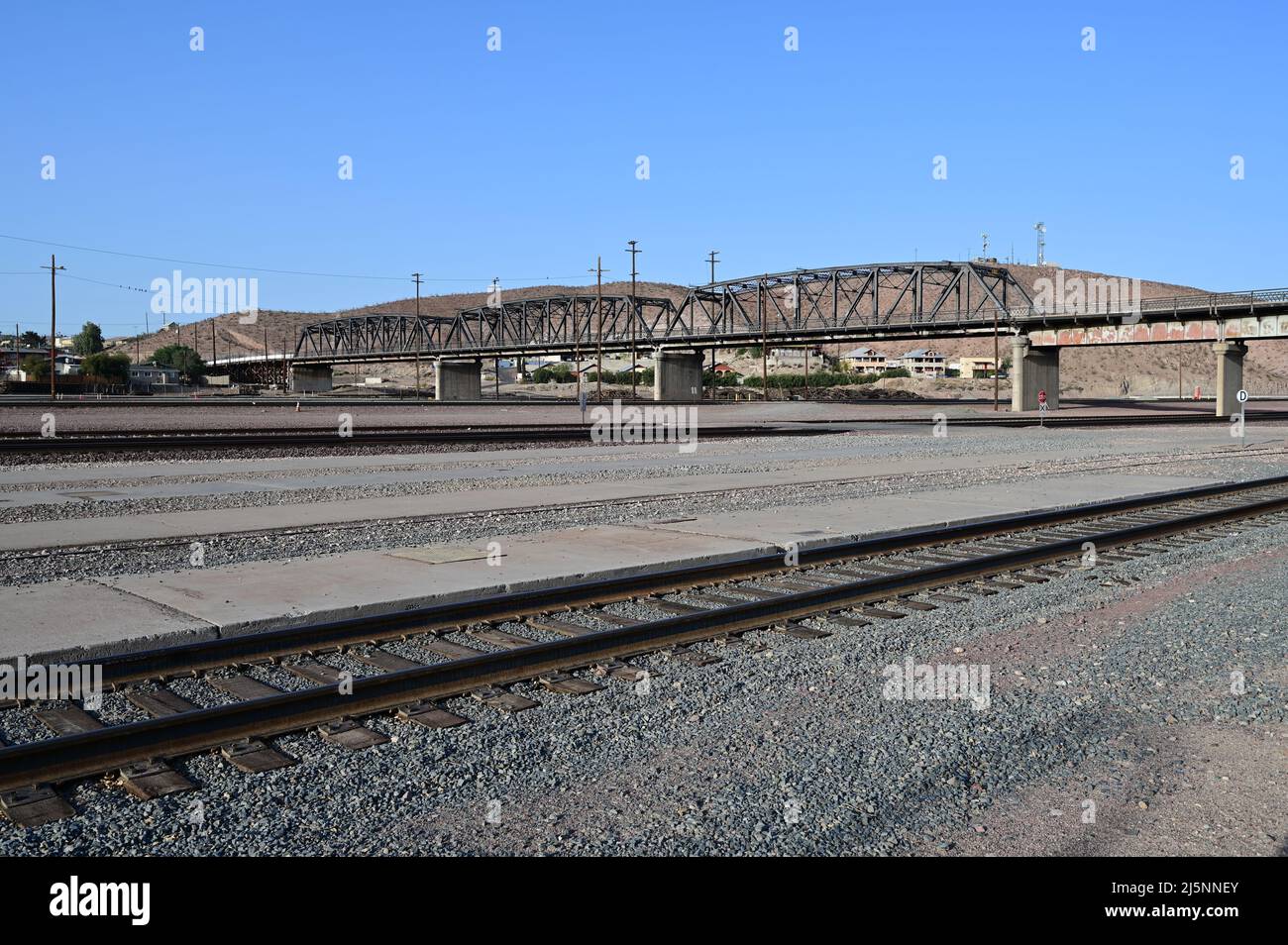 Road bridge crossing the railroad track at Barstow railway station ...