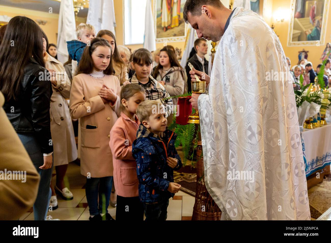 Communion in ukrainian catholic church hi-res stock photography and ...