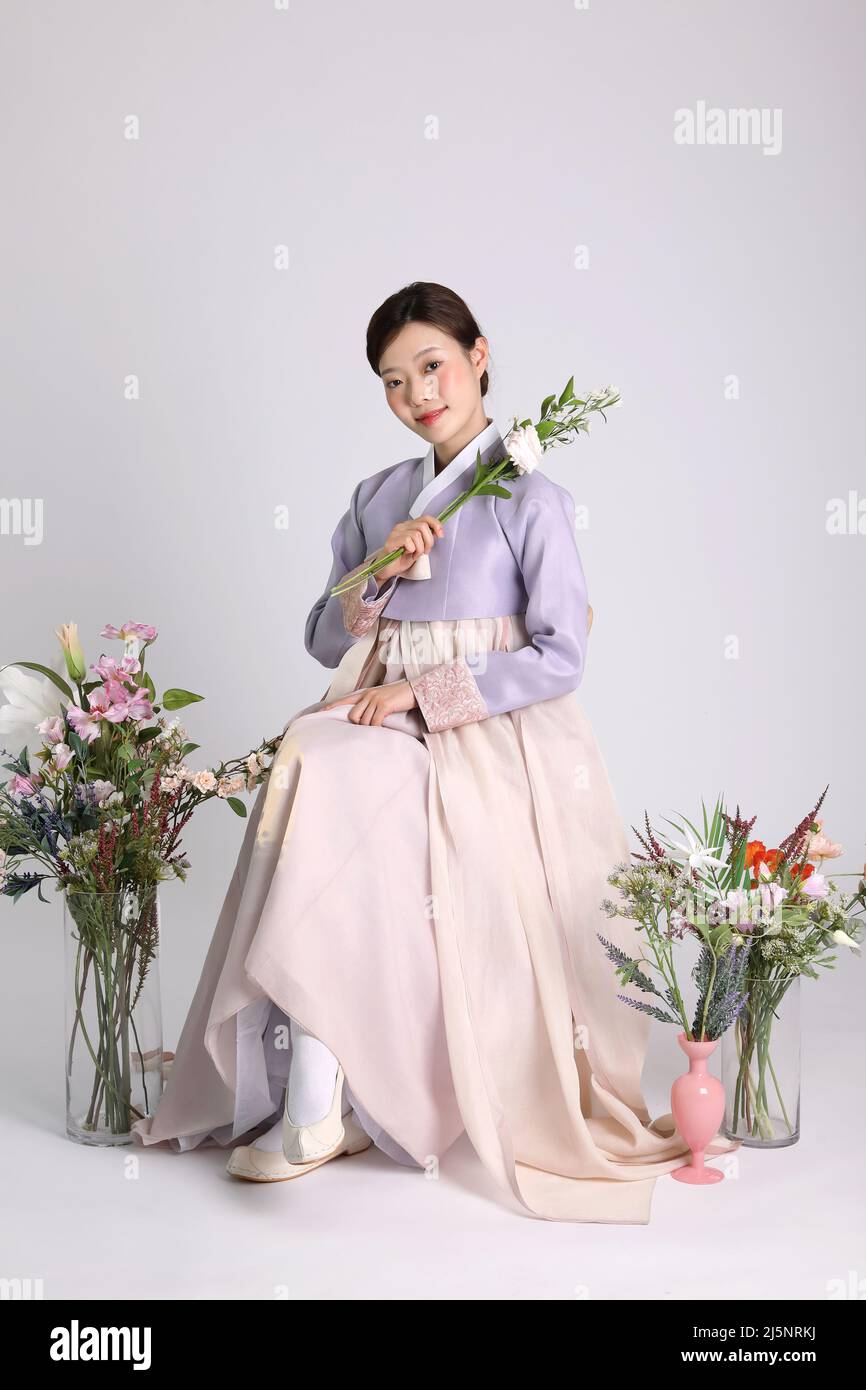 spring beauty concept, beautiful korean woman wearing hanbok with ...