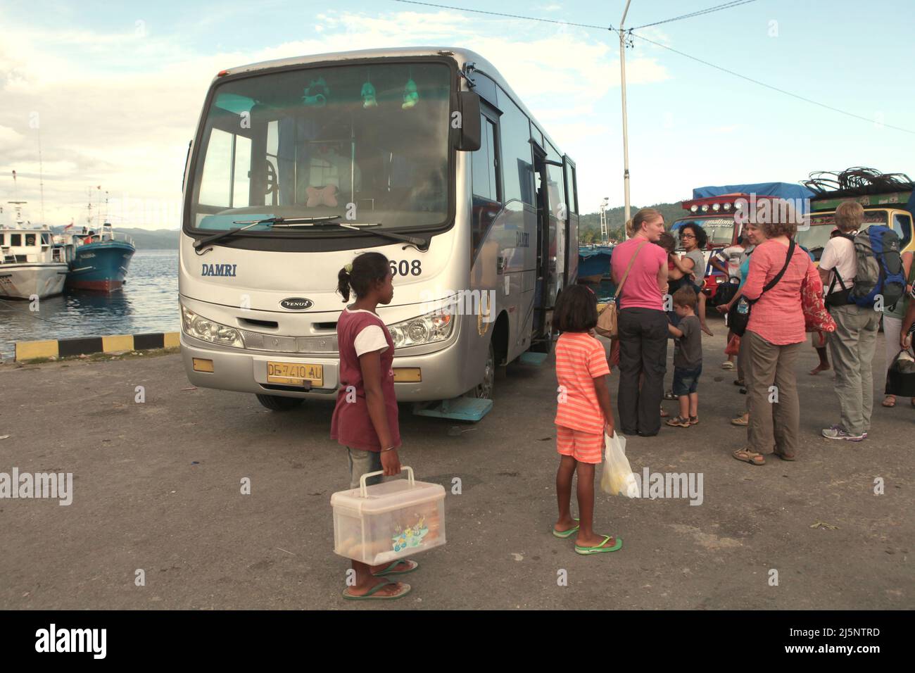 Women tourists having converstation before taking a chartered bus at ...
