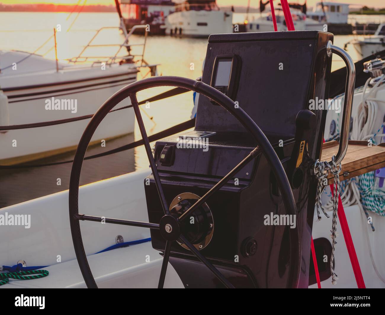 sailing yacht steering wheel, close up view Stock Photo - Alamy