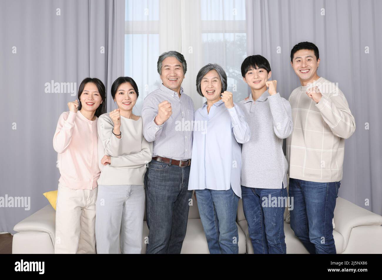Happy big asian family hi-res stock photography and images - Alamy