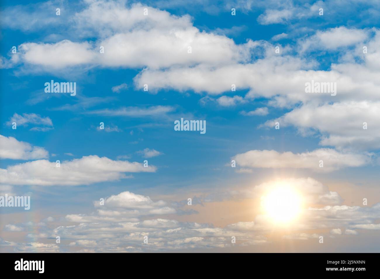blue sky during a sunny day with sunlight. sun somes clouds. white ...
