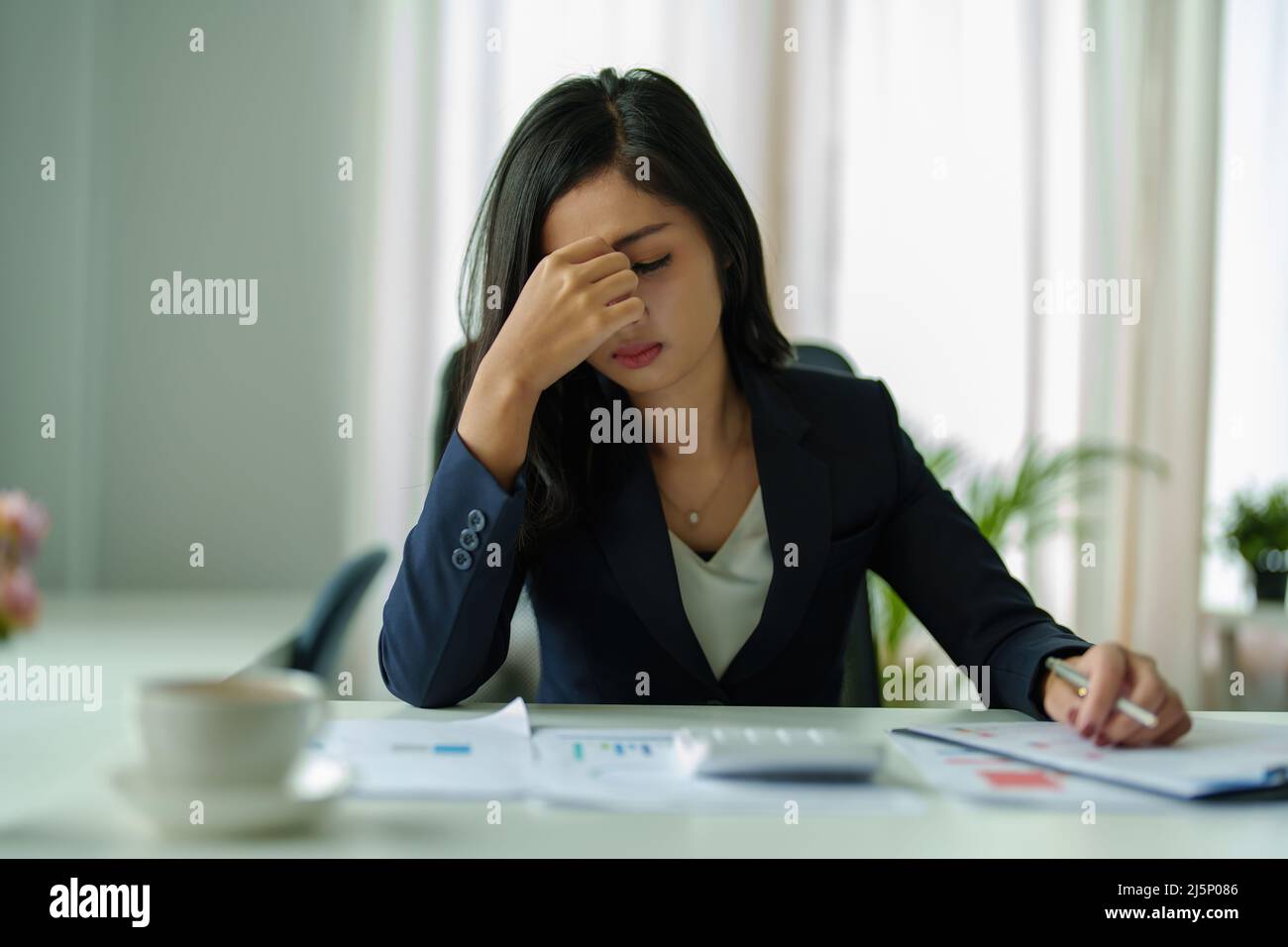 Concept Burnout Syndrome. Business Woman feels uncomfortable working ...