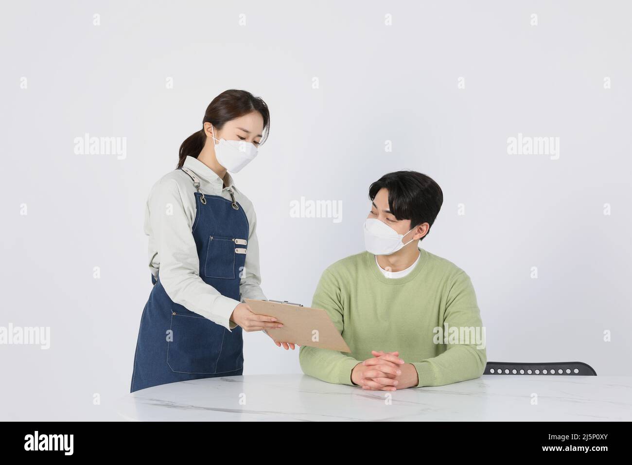 The boss apron hi-res stock photography and images - Alamy