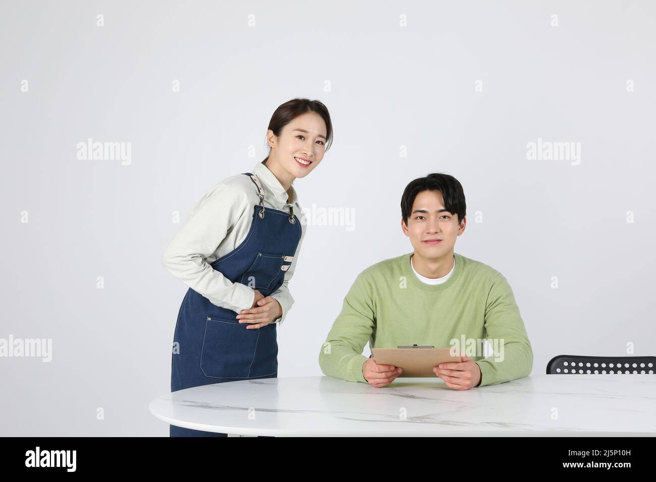 Asian Korean young man and woman startup concept customer and boss ...