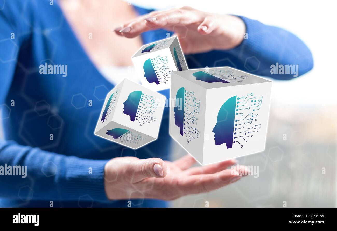 Machine learning concept between hands of a woman in background Stock ...