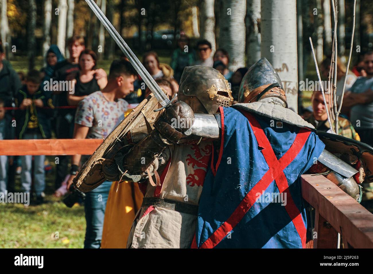 Battle of two knights in the arena. Epic sword fight Stock Photo - Alamy