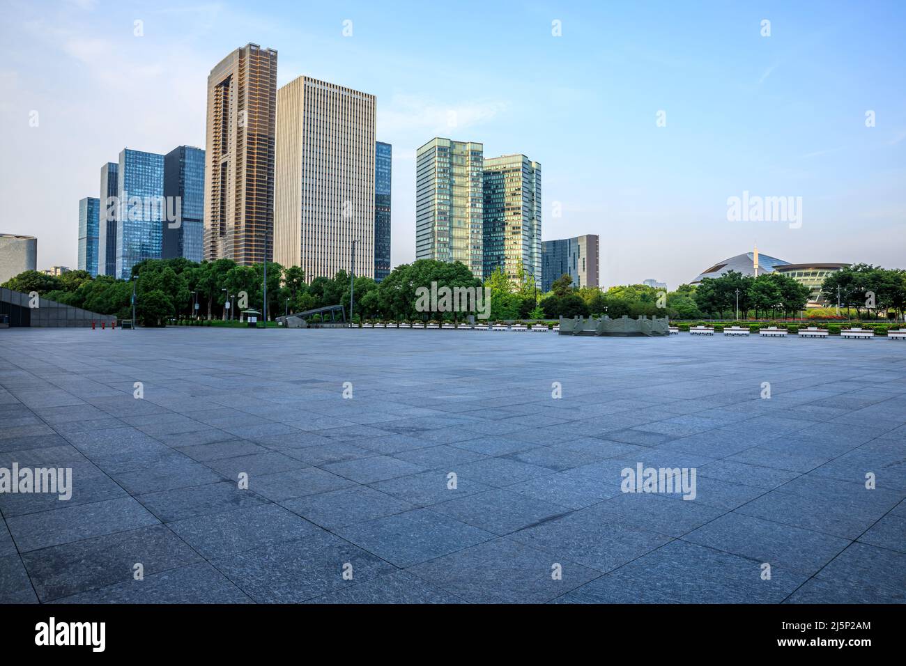 Empty square floor and city skyline with modern commercial buildings in ...