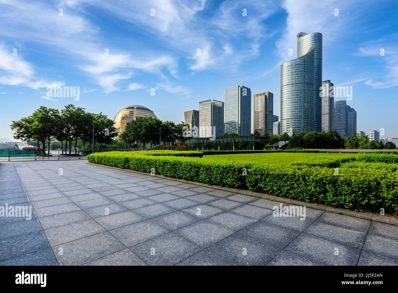 Empty square floor and city skyline with modern commercial buildings in ...