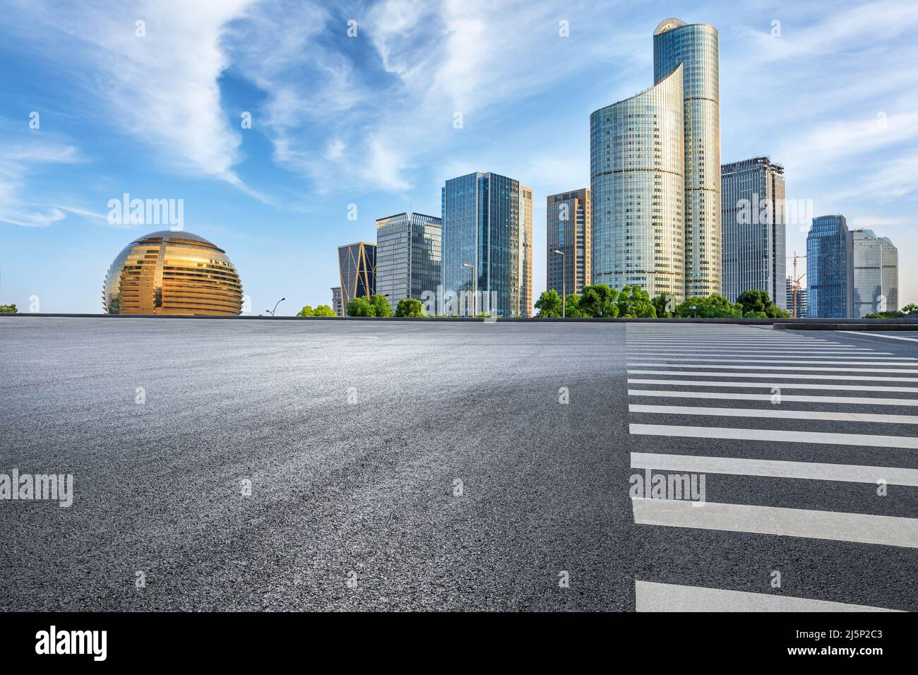 Empty asphalt road and modern city skyline with buildings in Hangzhou ...
