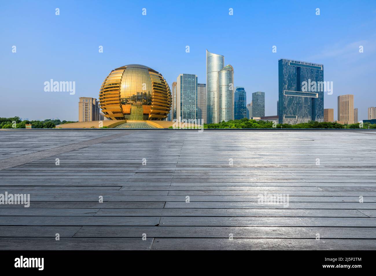 Empty plank square and city skyline with modern commercial buildings in ...