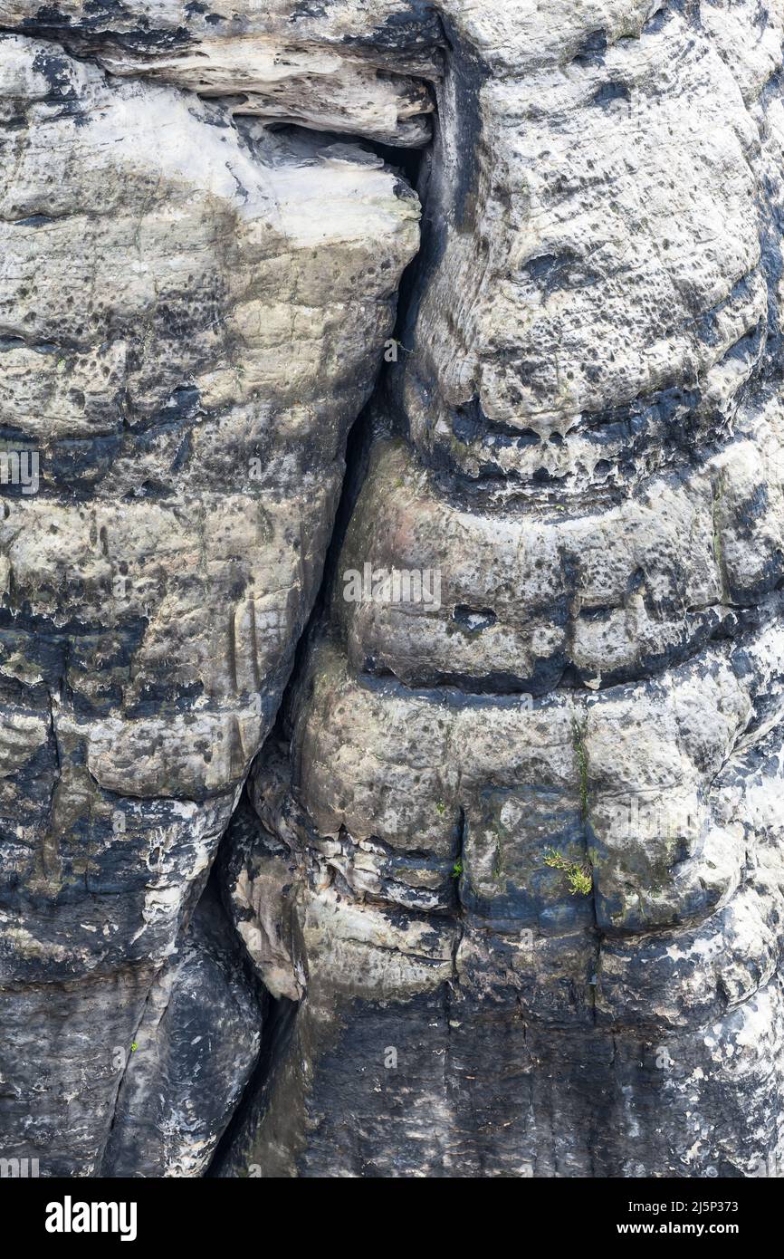 Huge natural cracked rock wall of sandstone with gap Stock Photo - Alamy