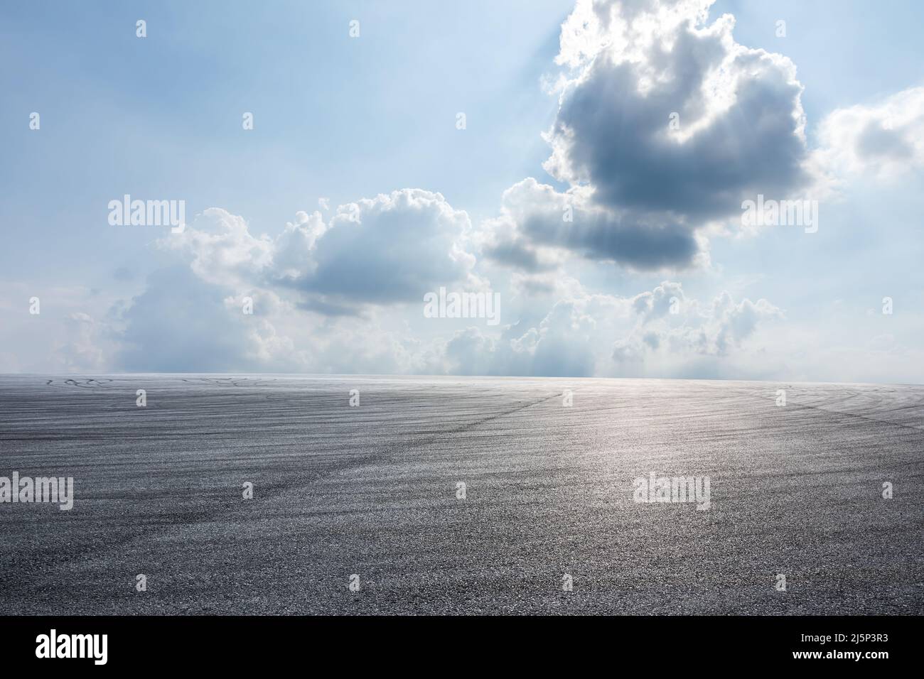 Asphalt road platform and beautiful blue sky with white clouds scene ...