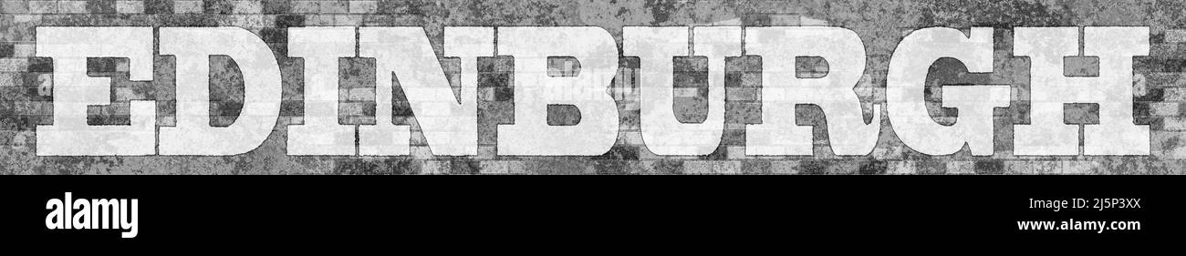 White lettering on a gray brick wall with the name of the city ...