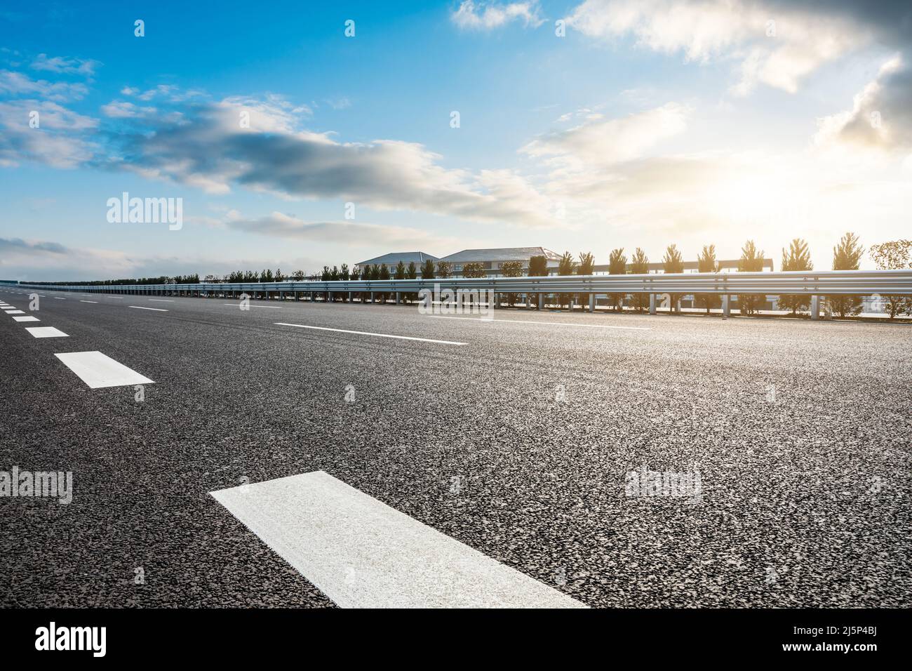 Asphalt highway and beautiful sky cloud landscape at sunset. Road and ...
