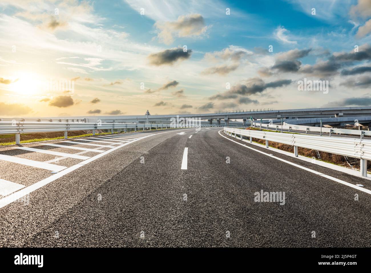 Asphalt highway and beautiful sky cloud landscape at sunset. Road and ...