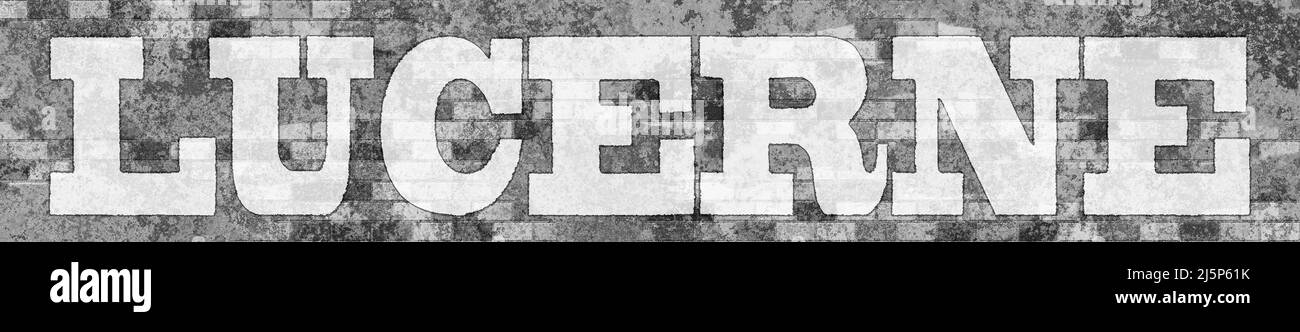White lettering on a gray brick wall with the name of the city LUCERNE ...