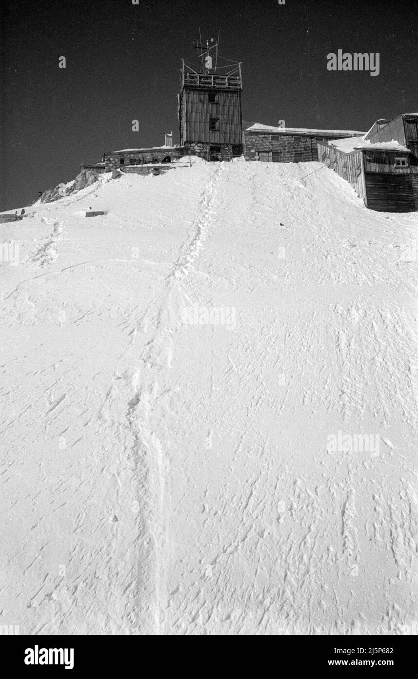 On February 21, 1965, the rope attendant Josef Rimmel propped up on the ...