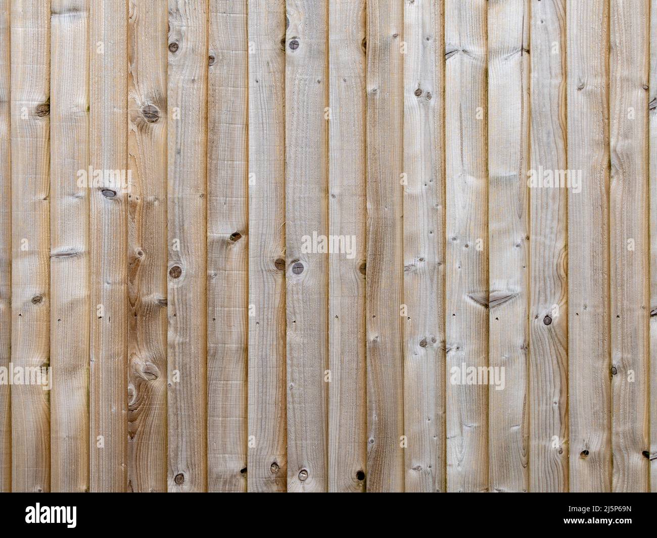 Vertical close boarding wooden timber planks background Stock Photo - Alamy