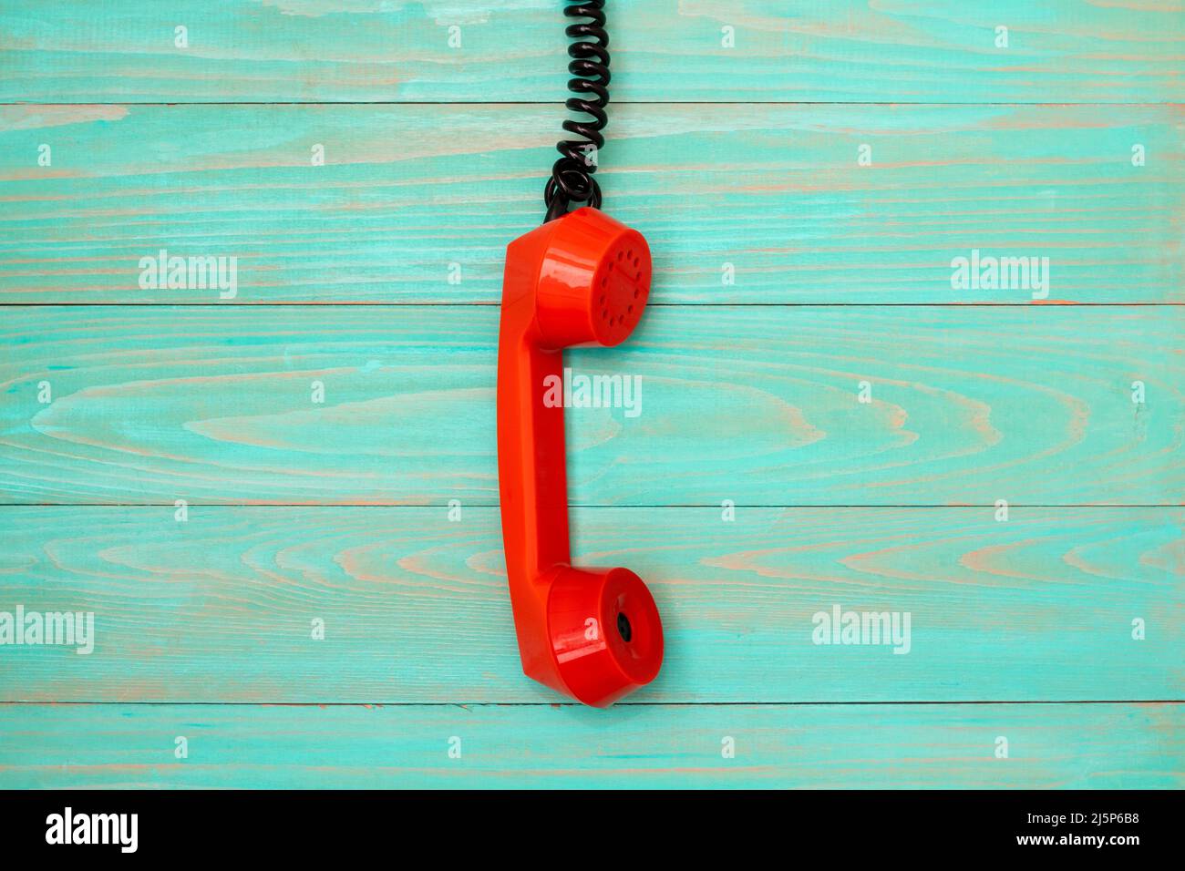 Vintage orange telephone handset hi-res stock photography and images ...