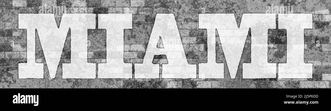 White lettering on a gray brick wall with the name of the city MIAMI ...