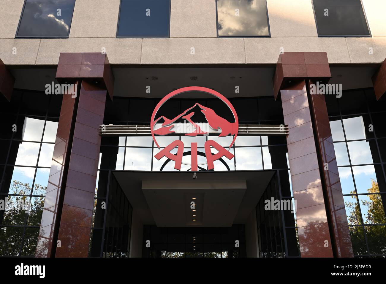 AIA Group logo above the entrance to 509 St Kilda Rd Stock Photo - Alamy