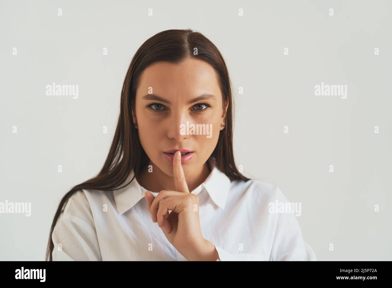 Shh hand hi-res stock photography and images - Alamy