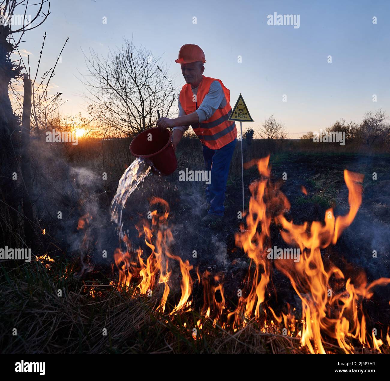 Pouring Water On A Campfire