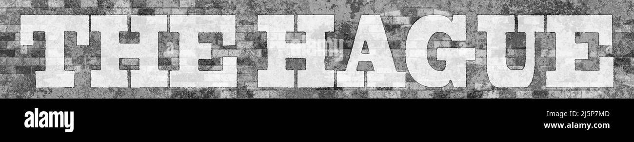 White lettering on a gray brick wall with the name of the city THE ...