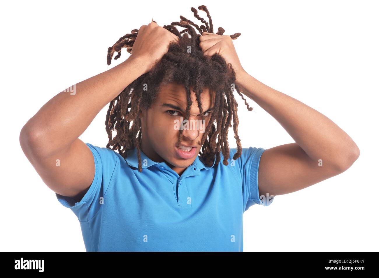 Portrait of angry teenage boy posing Stock Photo - Alamy