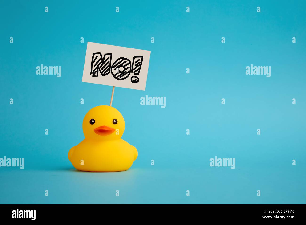 Rubber duck carries a signboard with the word no. Political activism ...